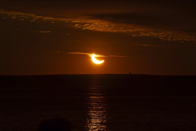 "A Crescent Sun": Northern Hemisphere Witnesses First Partial Solar ...